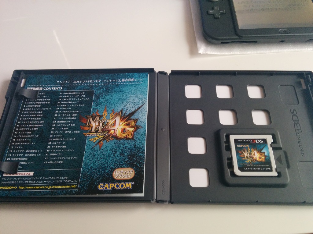 New nintendo 3DS LL 메탈릭 블랙 + 몬스터헌터4G | 오픈 케이스 갤러리